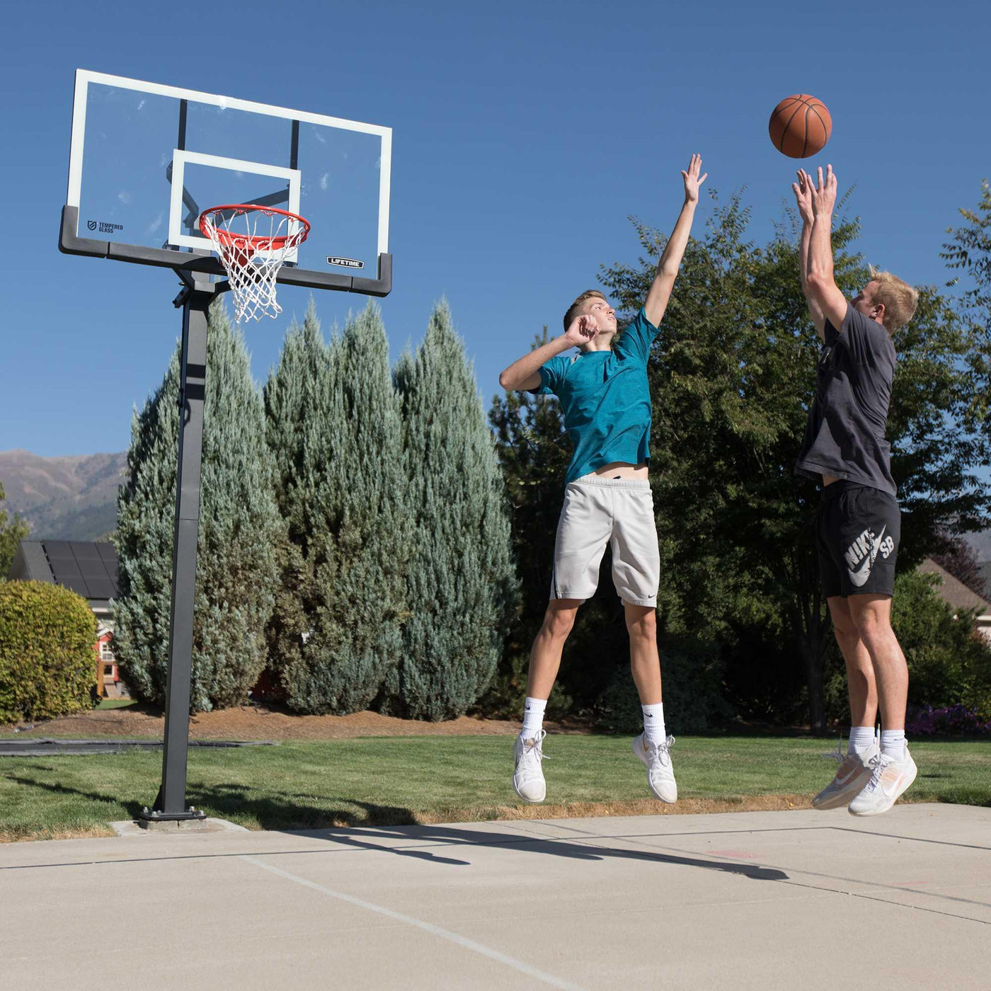 Lifetime Adjustable Basketball Hoop | 60-Inch Tempered Glass Backboard ...